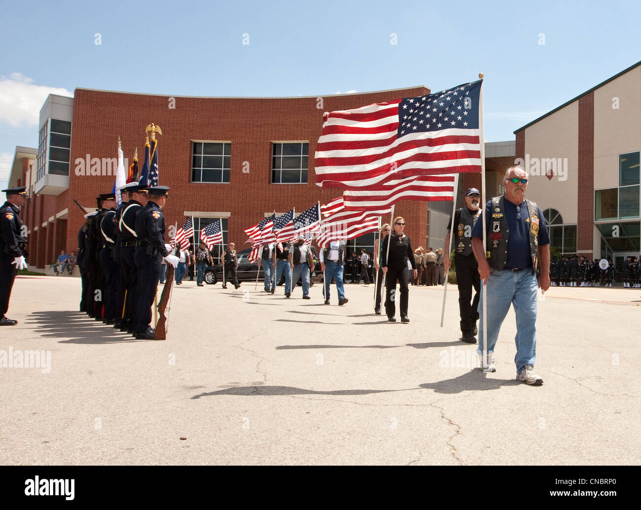 US veterans with flags at funeral for Austin Police Officer who was ...
