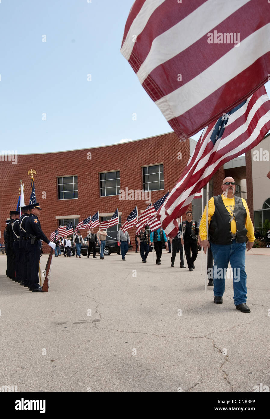 US veterans with flags at funeral for Austin Police Officer who was ...