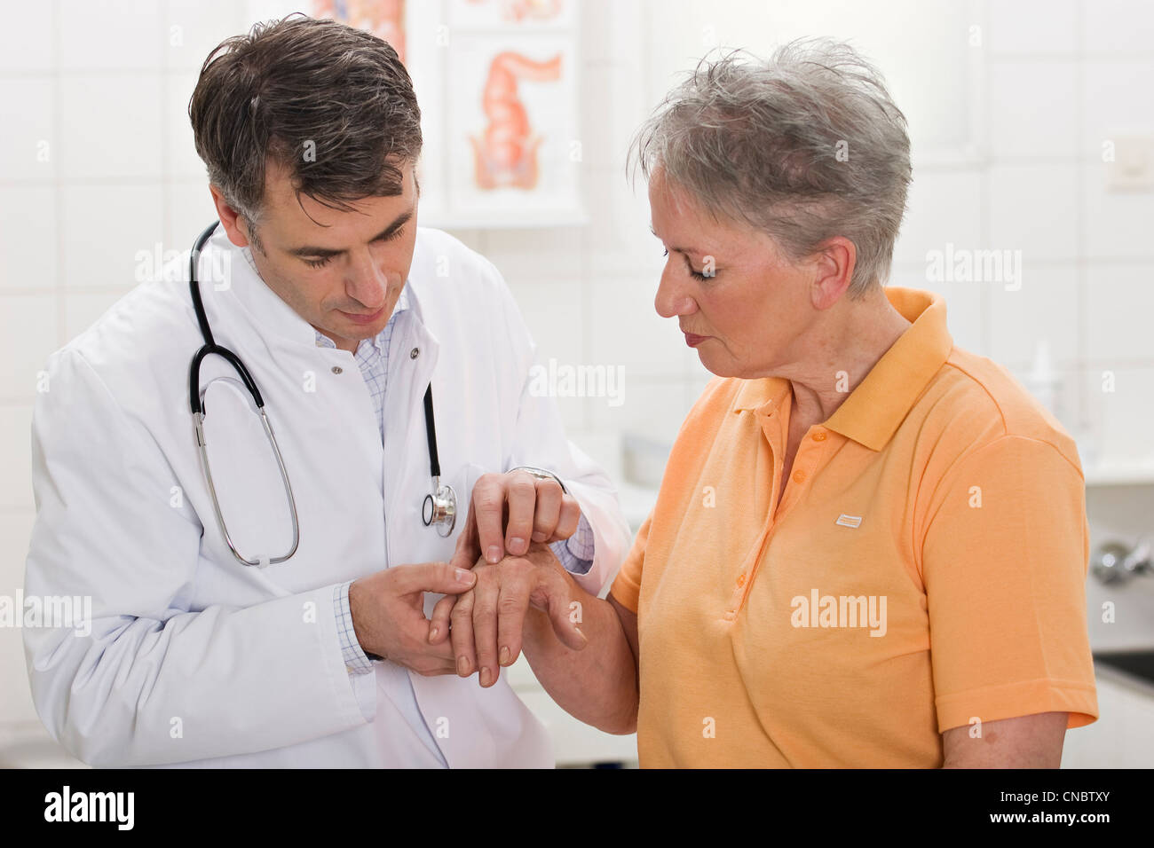 Rheumatologist female patient hi-res stock photography and images - Alamy