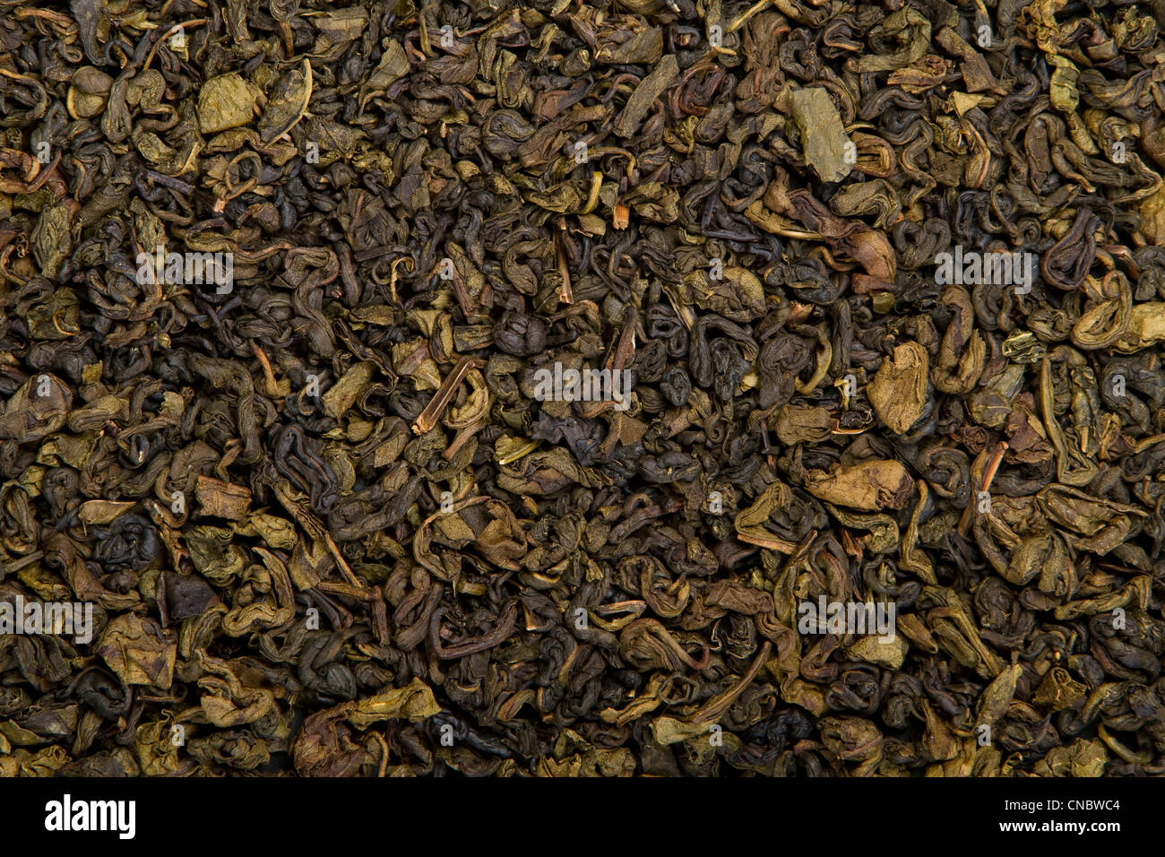 selective big leaf green tea as a background Stock Photo - Alamy