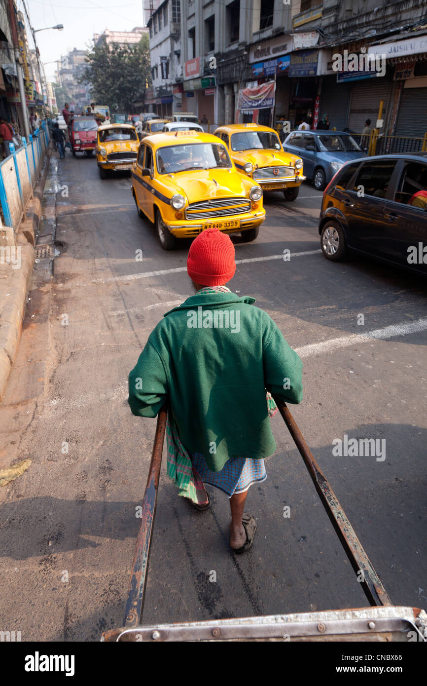 Hand pulled rickshaw calcutta street scene calcutta india hi-res stock ...