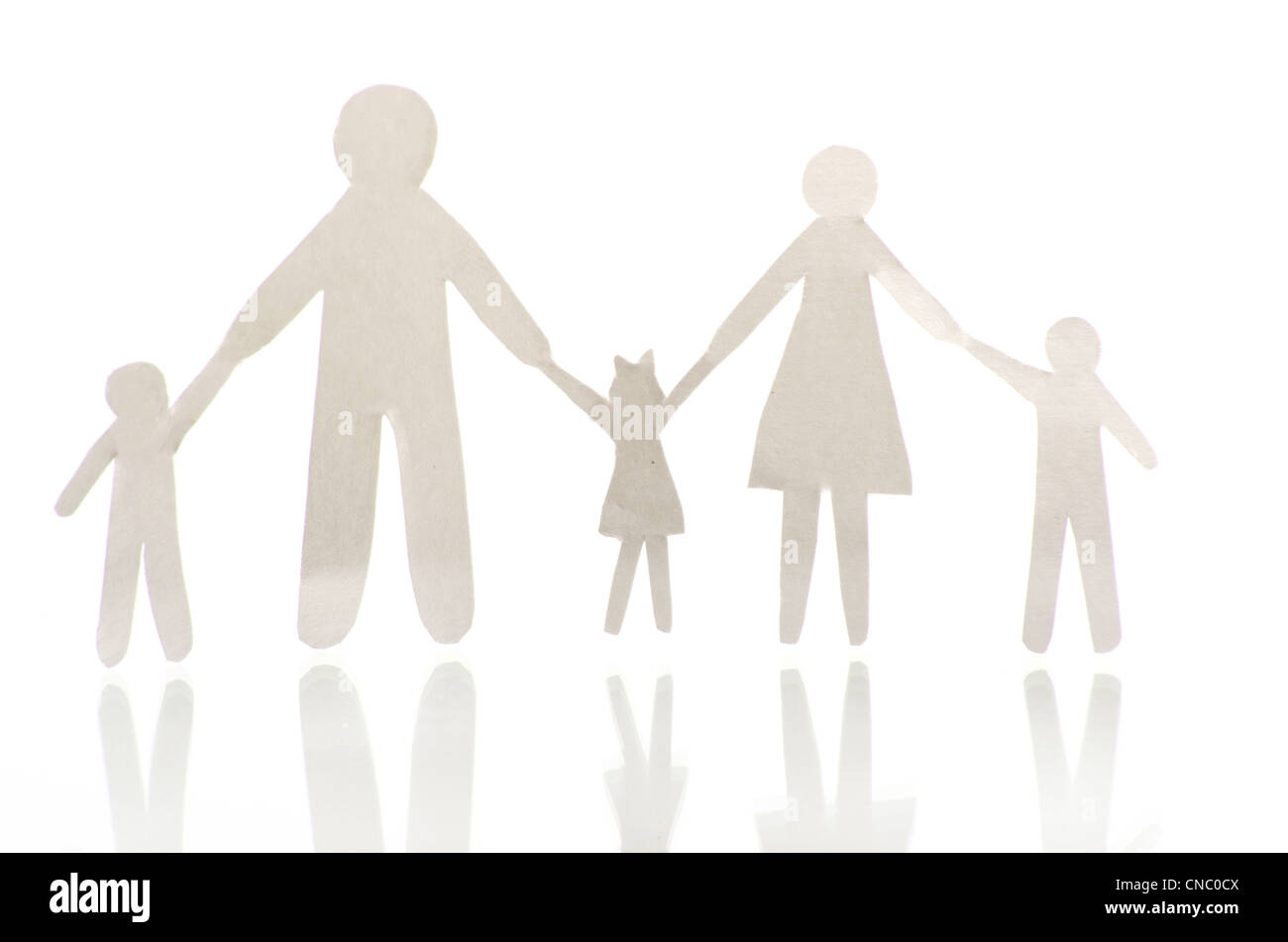 Paper cut family, isolated on black background Stock Photo - Alamy
