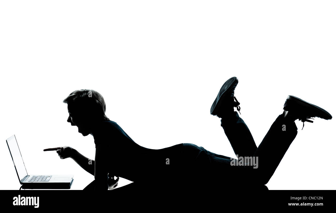 Child using laptop silhouette hi-res stock photography and images - Alamy