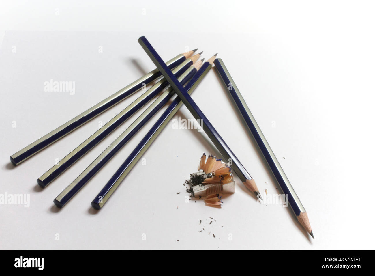 Artist sharpened pencils with a sharpener Stock Photo - Alamy