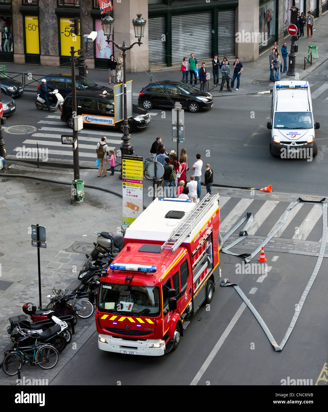 Paris firefighters and police in action Stock Photo - Alamy