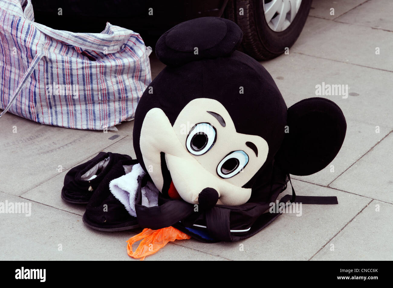 A Mickey Mouse costume on the floor Stock Photo - Alamy
