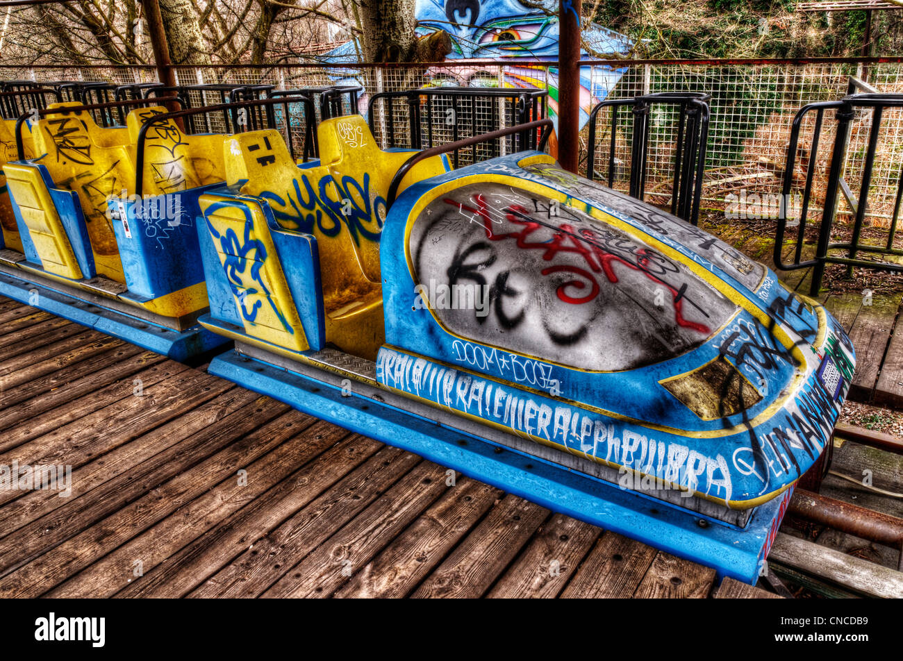 An abandoned roller coaster train in the funfair in Treptower Park (aka ...
