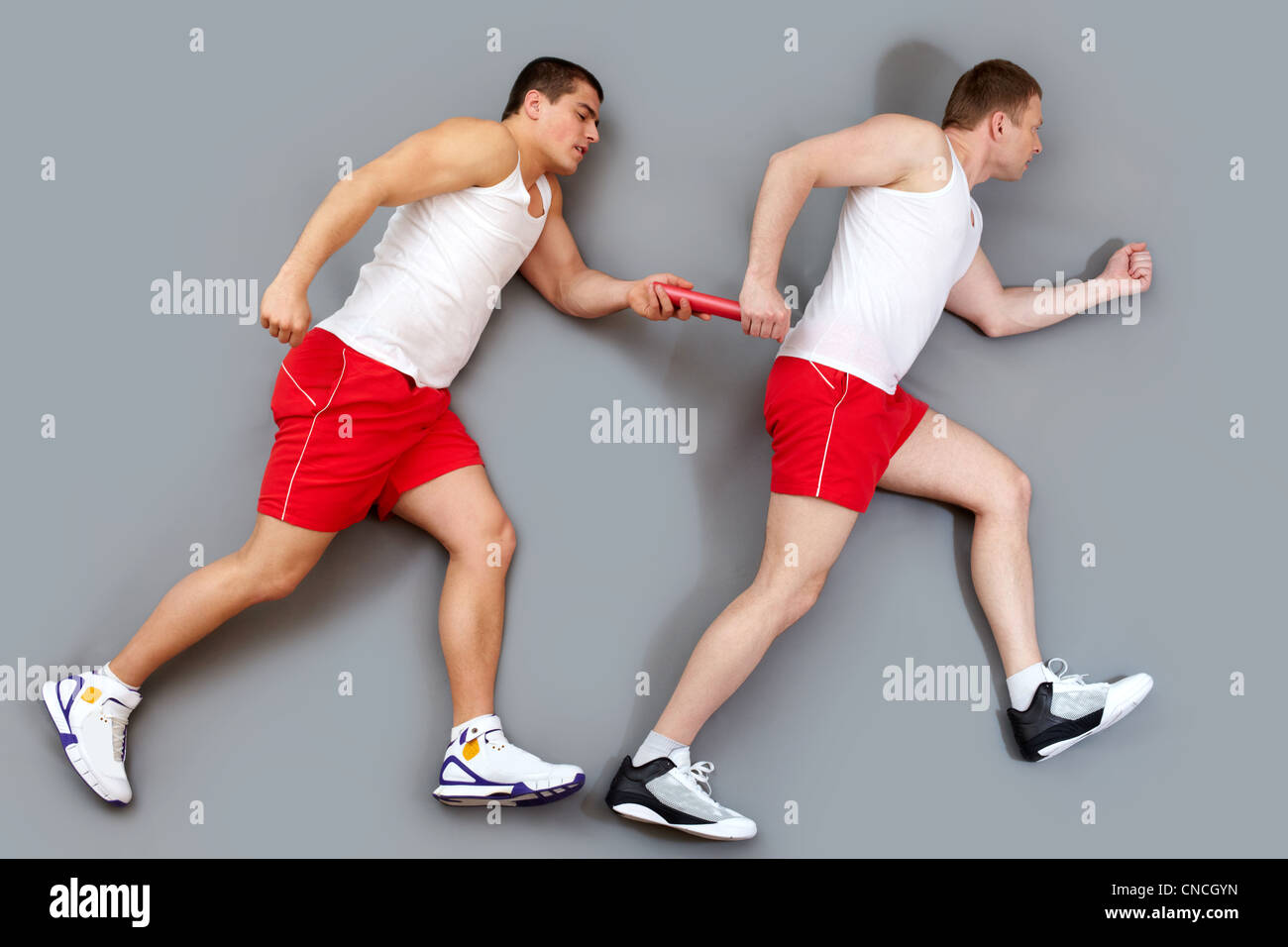 Person passing a relay baton hi-res stock photography and images - Alamy