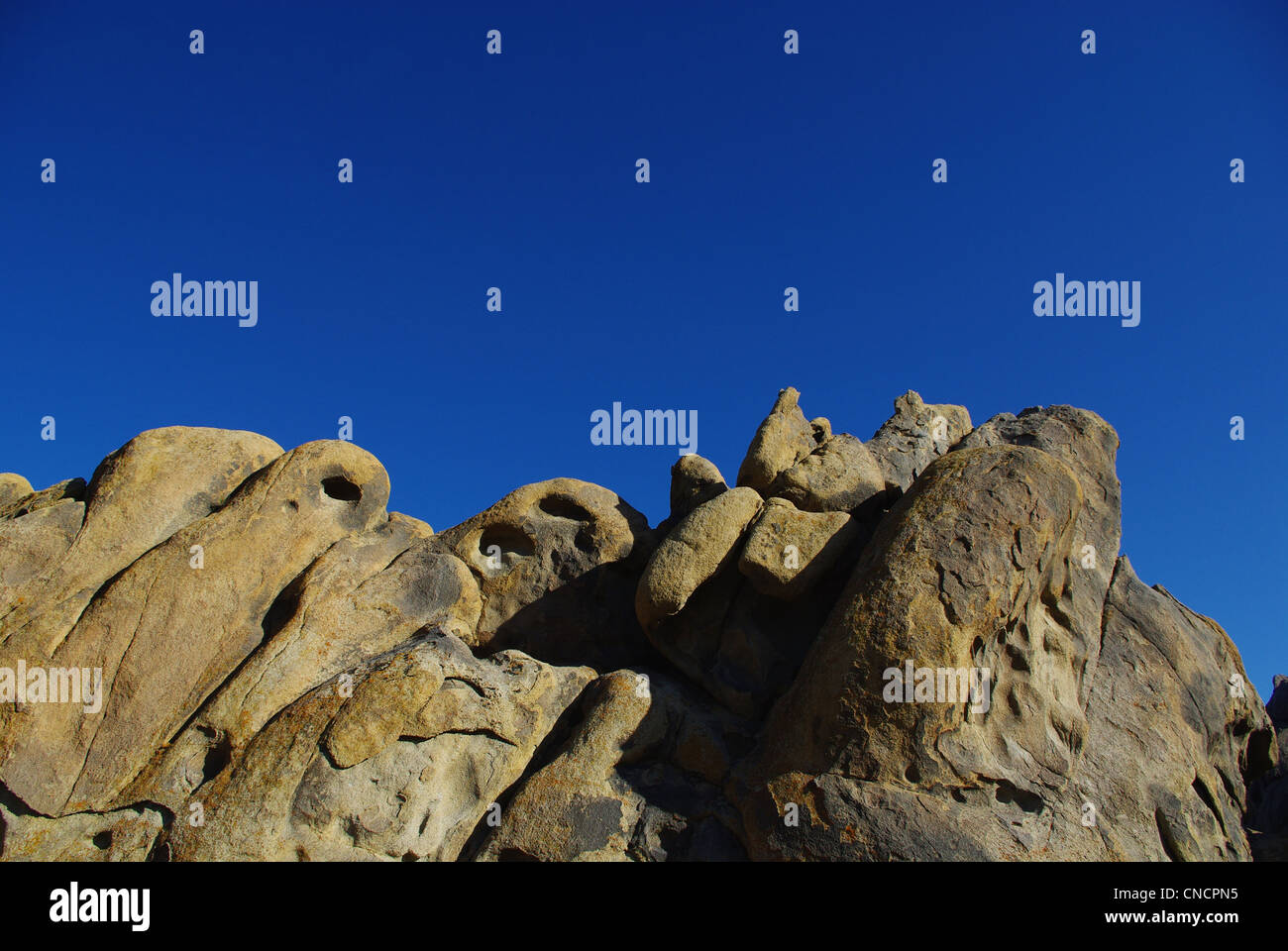 Alabama Hills rocks and blue sky, California Stock Photo - Alamy