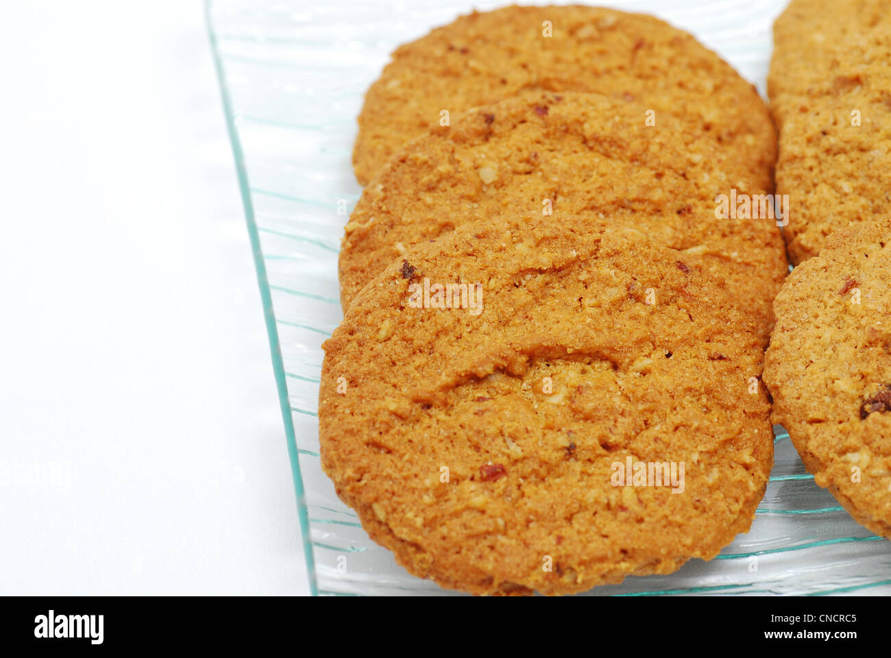 Macro cookies on white background Stock Photo - Alamy