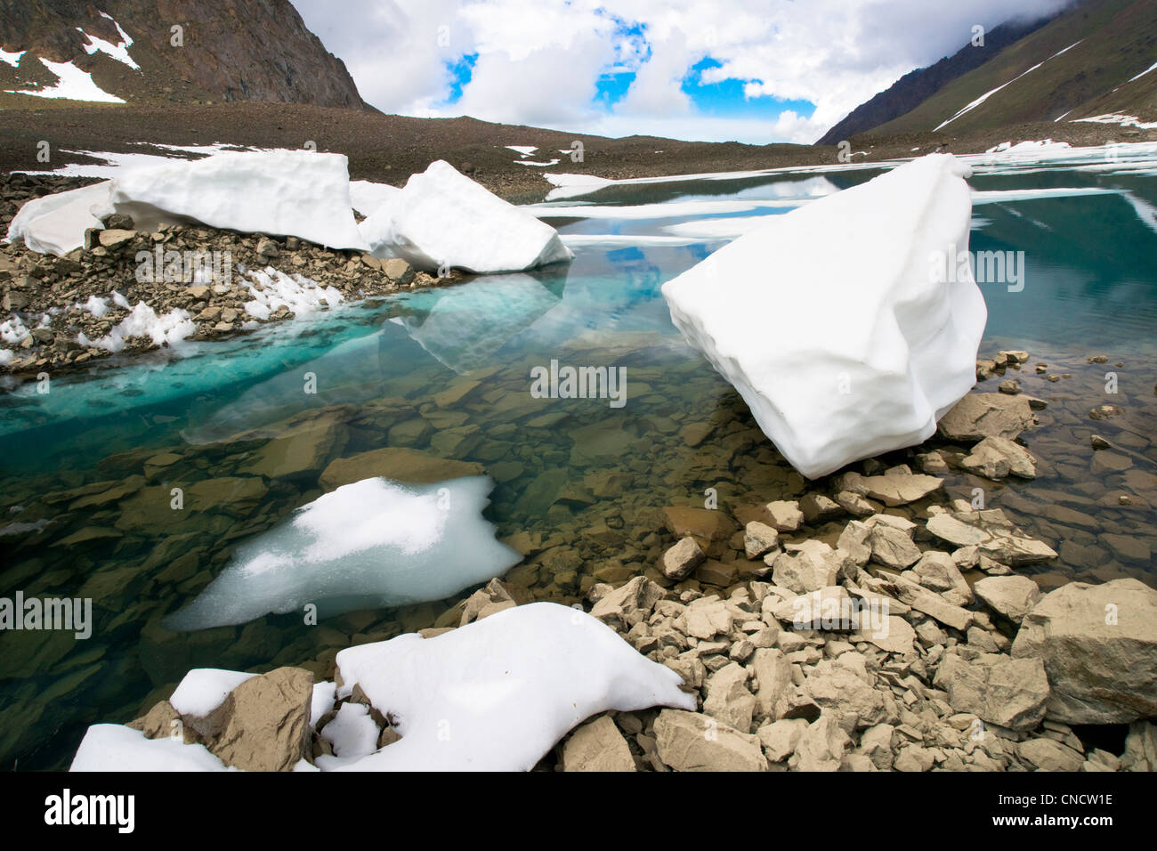 Scenic view of meltwater and snow chunks at Ram Valley Glacier Lake, Chugach State Park ...