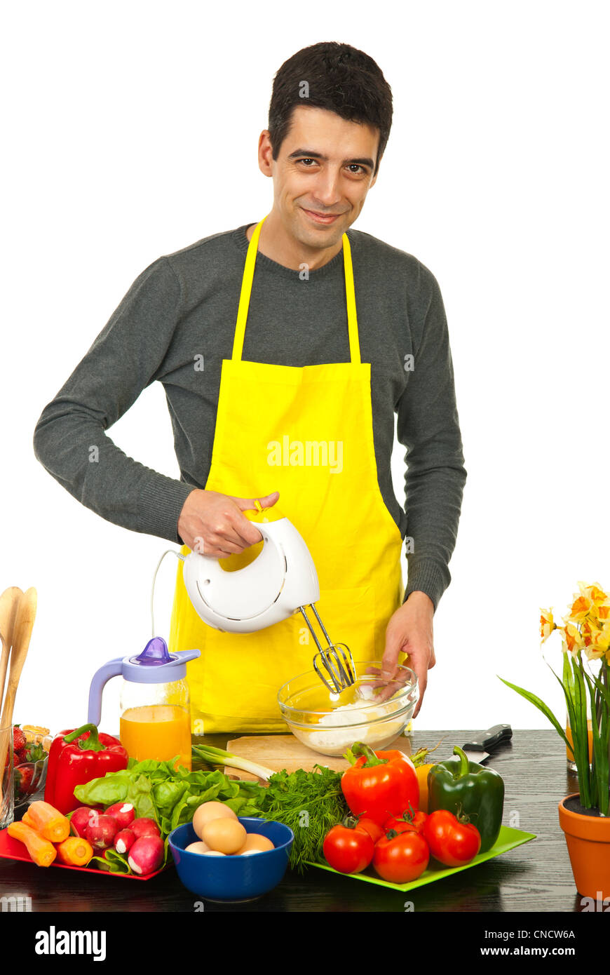 Cheerful chef man baking in kitchen against white background Stock ...