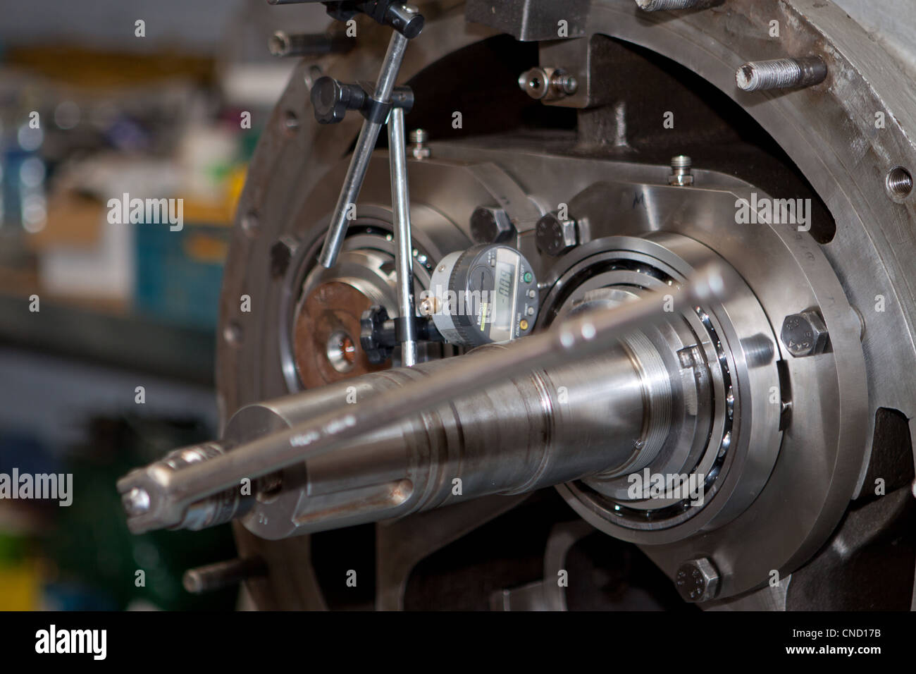 Engineer repairing heavy mechanical equipment Stock Photo - Alamy