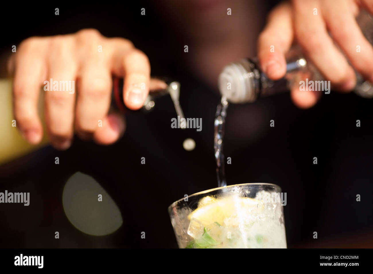 Bartender making a cocktail Stock Photo - Alamy