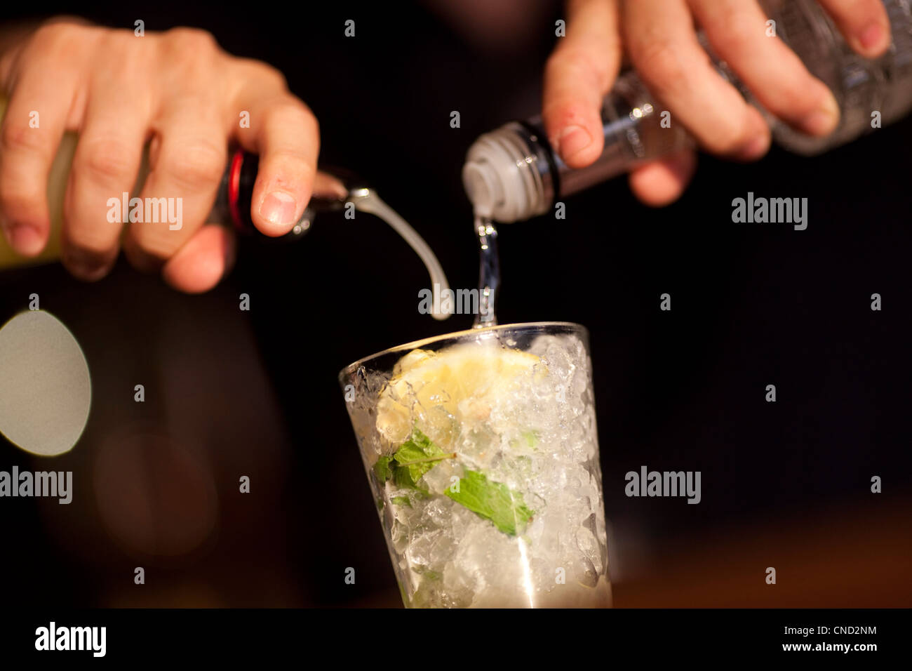 Bartender making a cocktail Stock Photo - Alamy