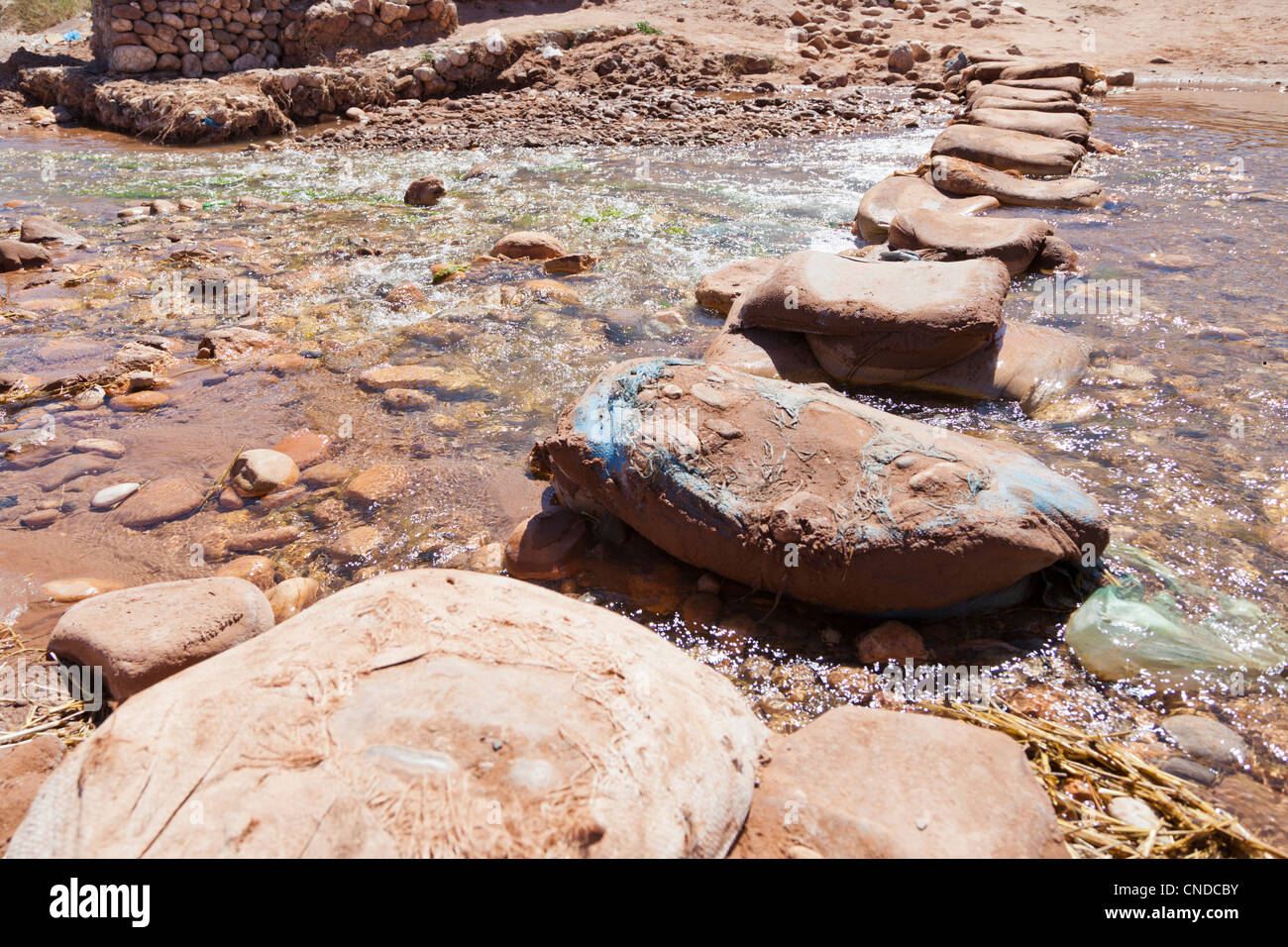 stone path crossing a small river Stock Photo - Alamy