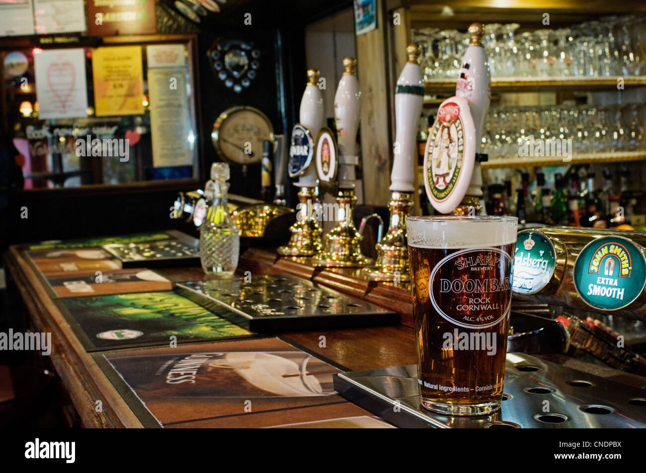 A pint on the bar of a traditional country pub Stock Photo - Alamy