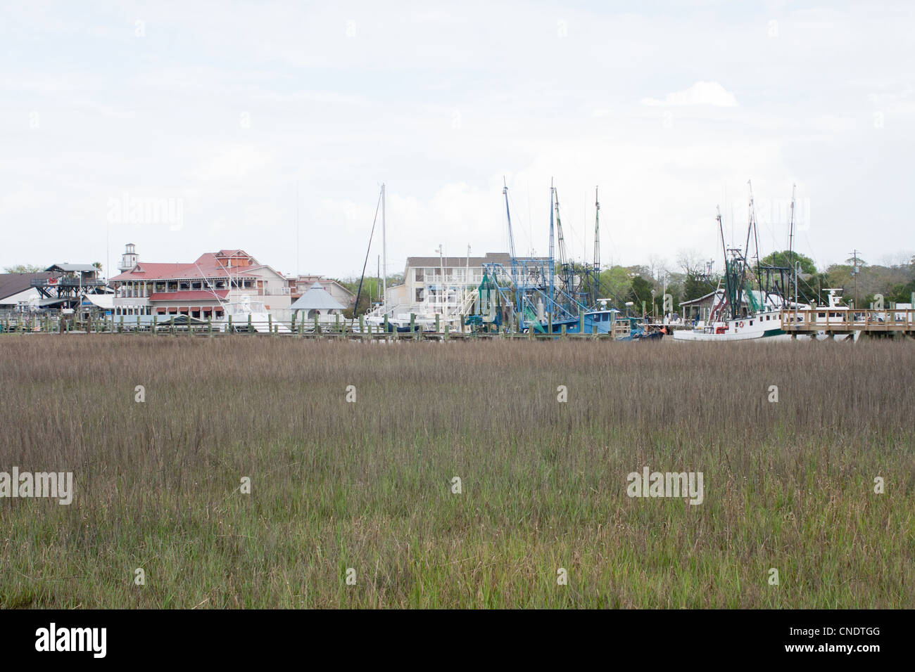 restaurants and shrimp boats across marsh at Shem Creek near Charleston ...