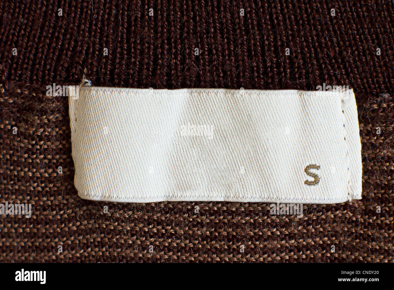 Macro of s size clothing label Stock Photo - Alamy