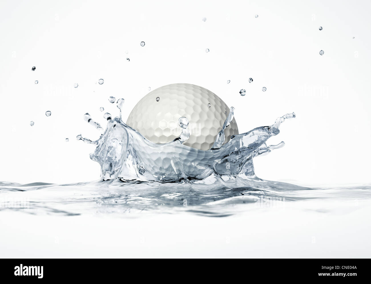 White golf ball splashing into water, forming a crown splash. On white ...