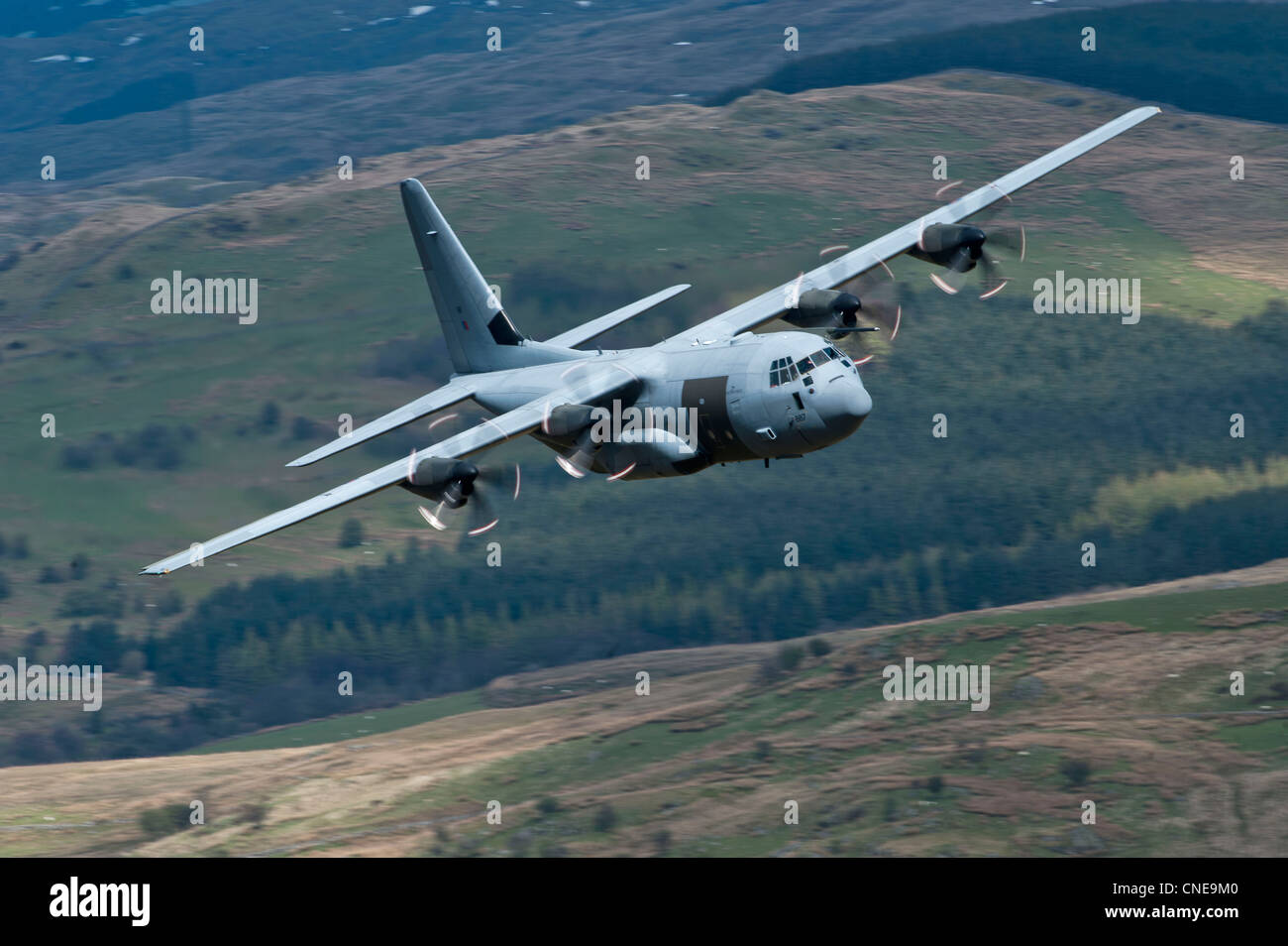 a c-130 low flying in the mach loop north wales Stock Photo - Alamy
