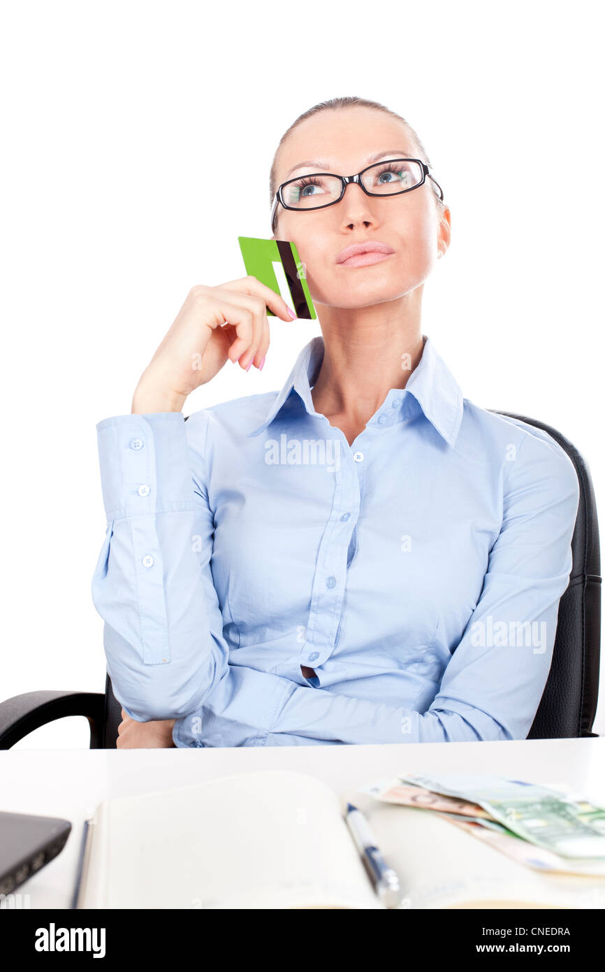 Business woman on workplace with card in hand Stock Photo - Alamy