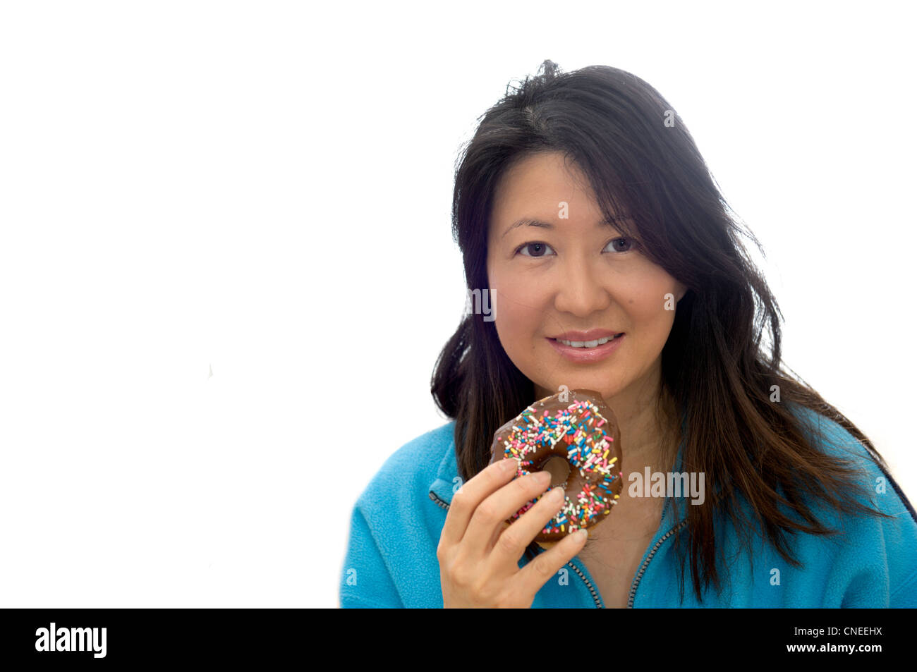 attractive asian lady with donut Stock Photo - Alamy