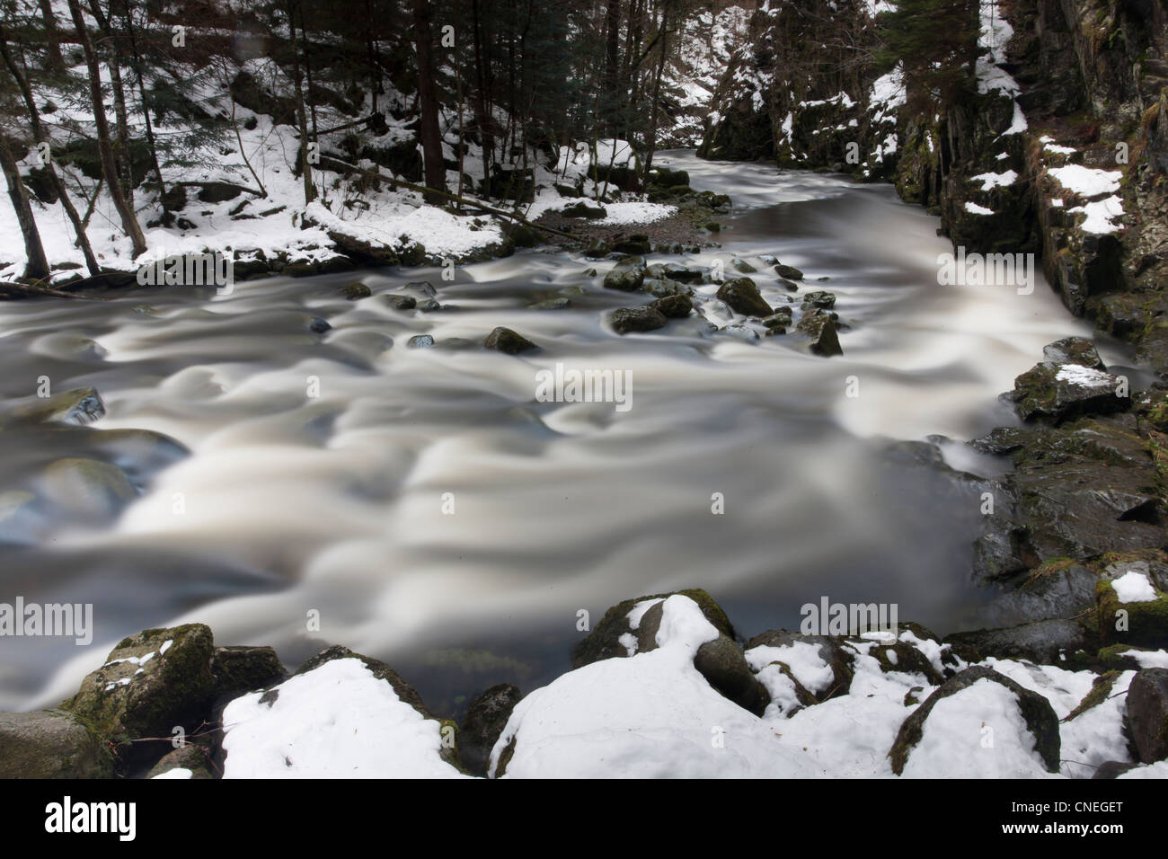 River in snowy scenery Stock Photo - Alamy