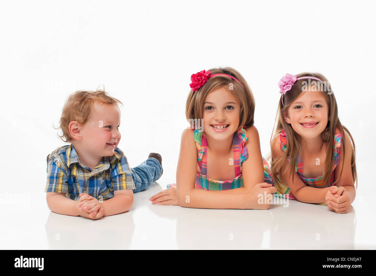 Portrait of three happy children Stock Photo - Alamy