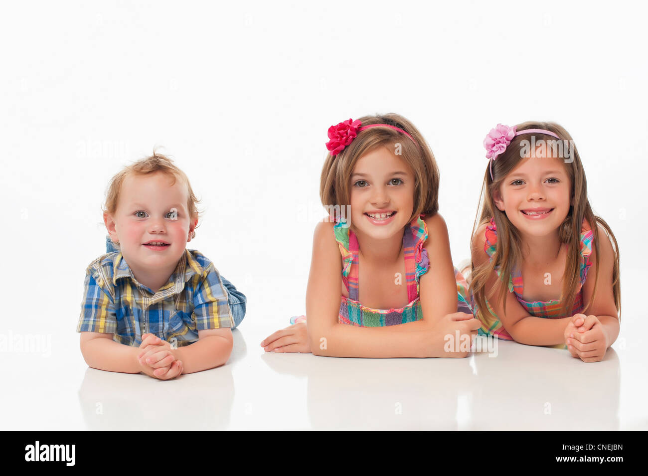 Portrait of three happy children Stock Photo - Alamy