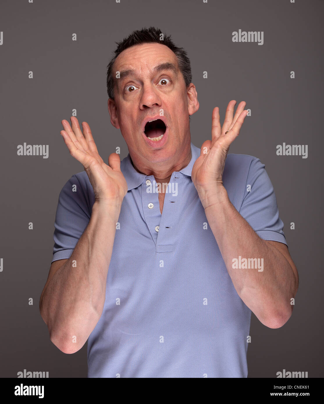 Hands raised in horror hi-res stock photography and images - Alamy