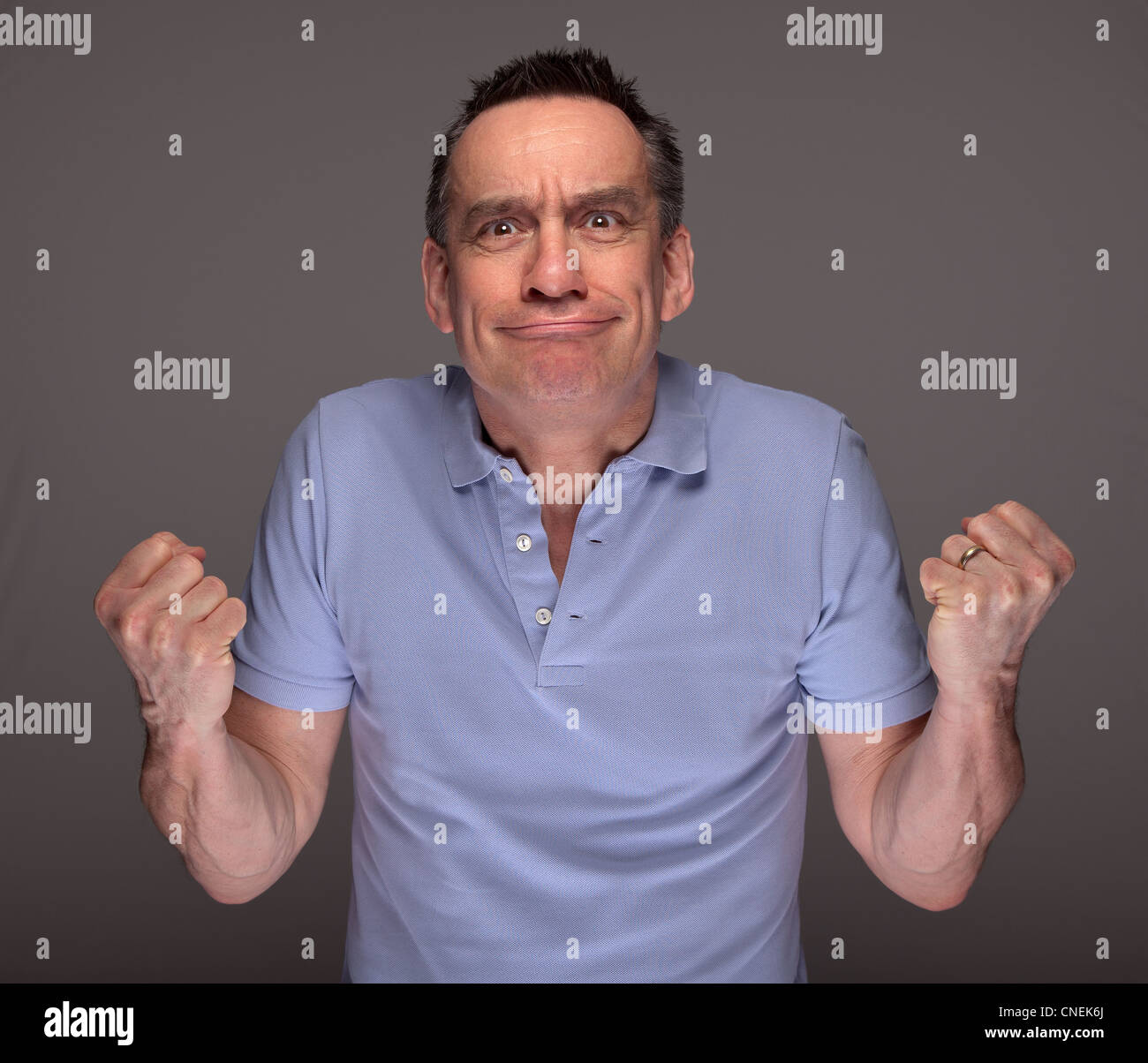 Man pulling angry face hi-res stock photography and images - Alamy