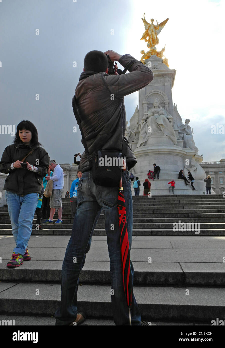 Man photographing Victory with two seated figures on the Victoria ...