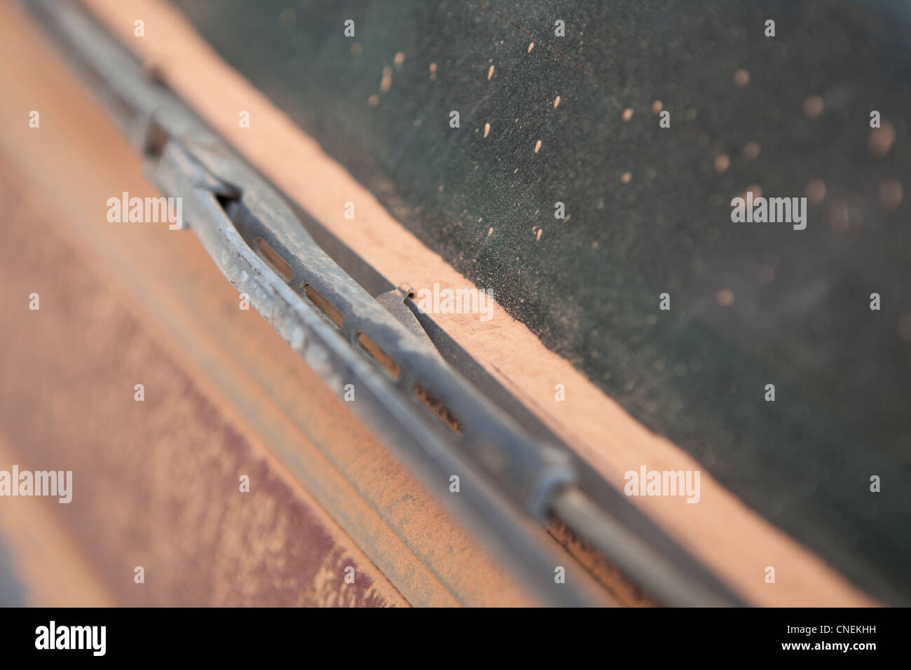 Red dust accumulation on a car after it has been for a drive through ...