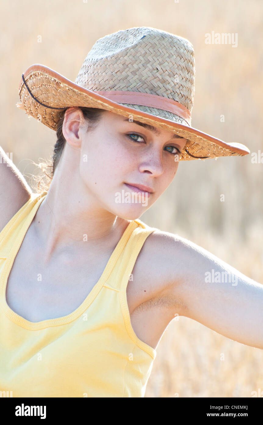 Beautiful cowboy girl posing Stock Photo - Alamy