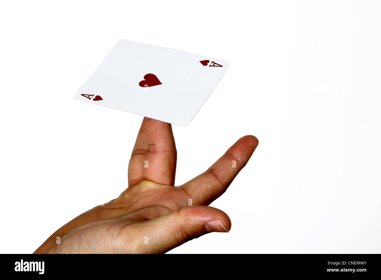 Ace of hearts balanced on one finger Stock Photo - Alamy