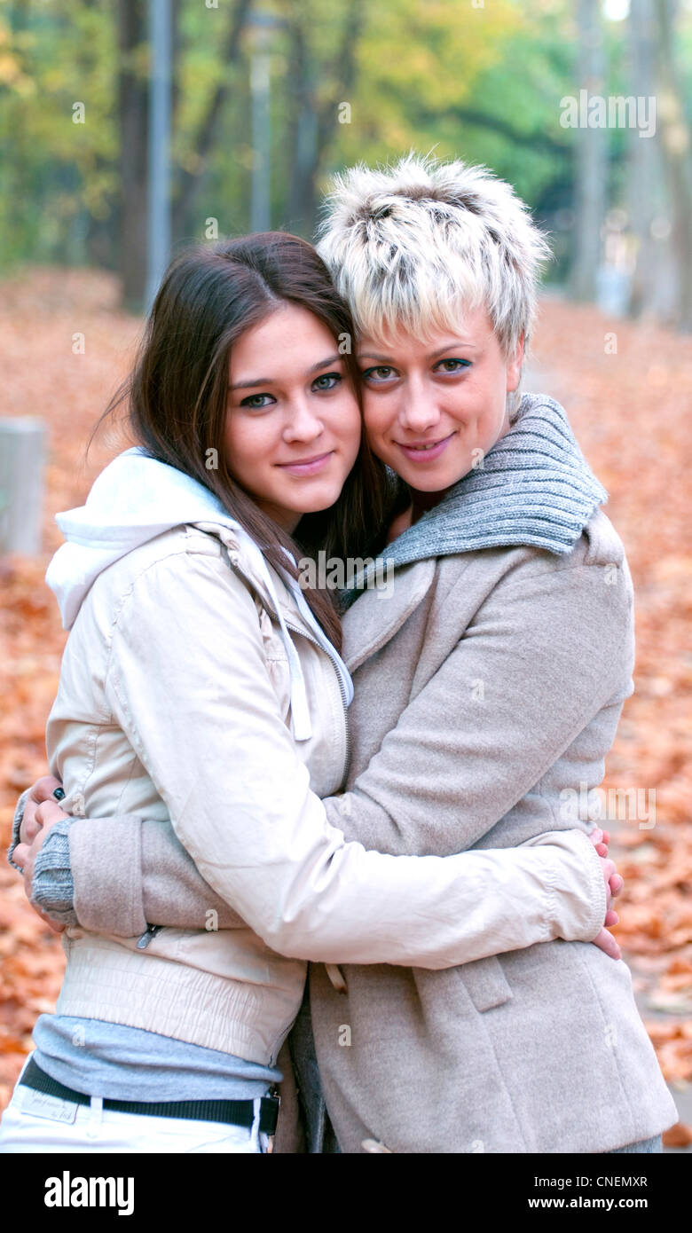 Two girls hugging in nature - Friendship concept Stock Photo - Alamy