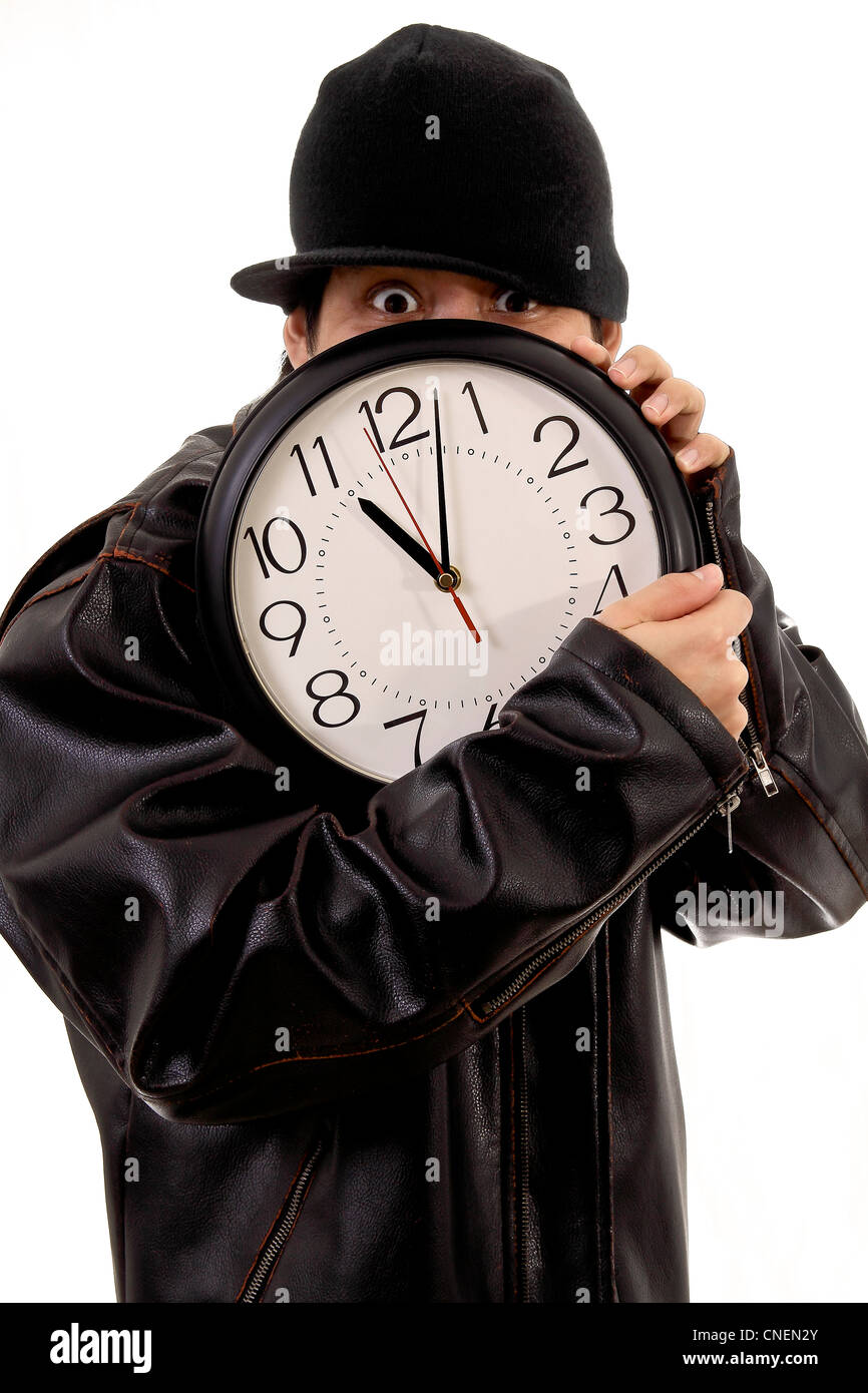Thief stealing a clock Stock Photo - Alamy