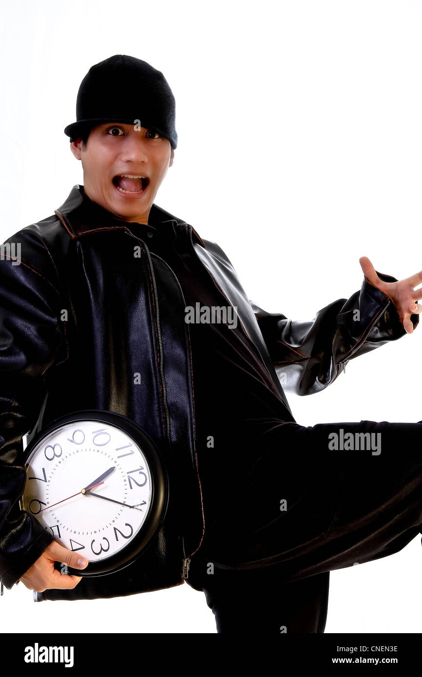 Thief stealing a clock Stock Photo - Alamy