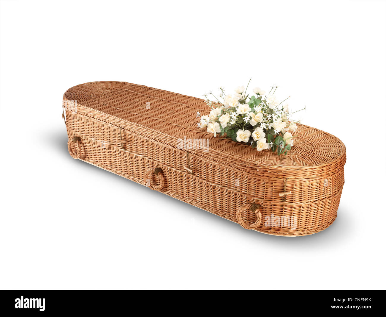 a wicker bio-degradable eco coffin isolated on white with clipping path ...