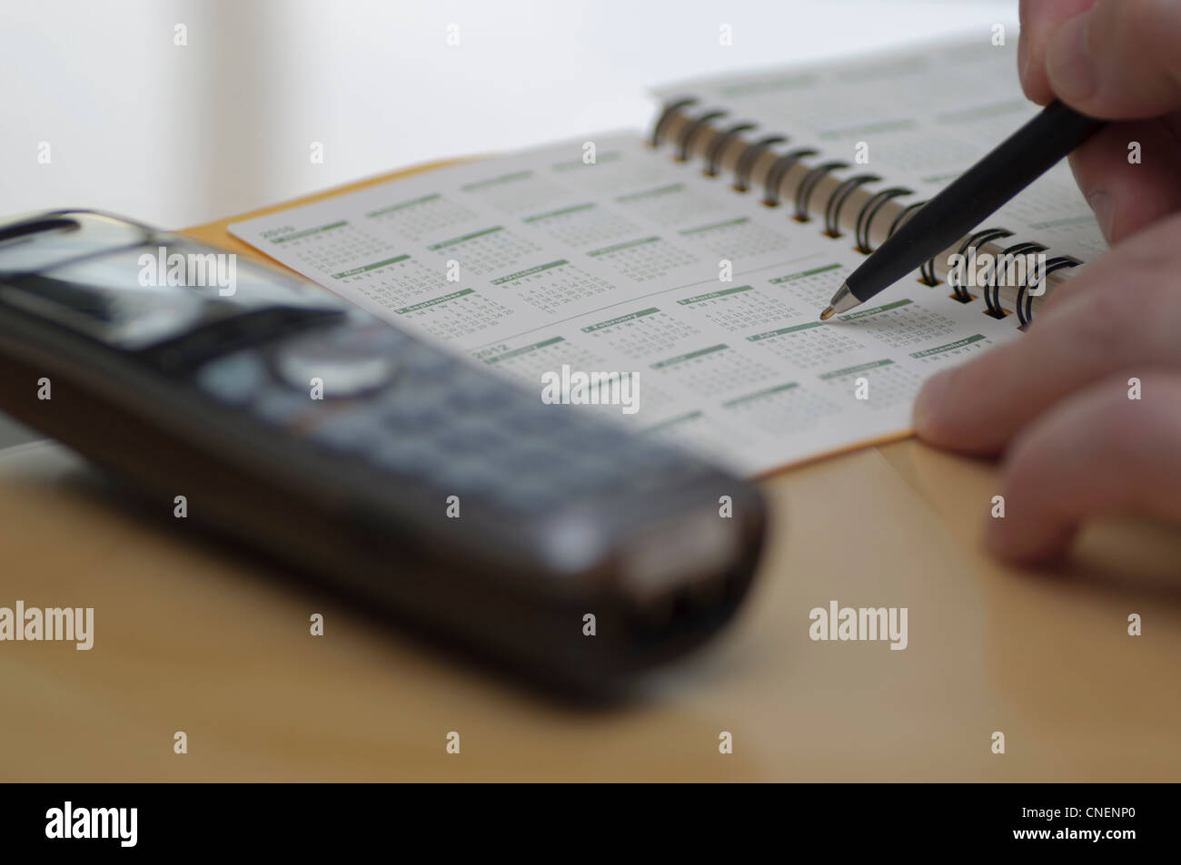 Schedule arranging hi-res stock photography and images - Alamy