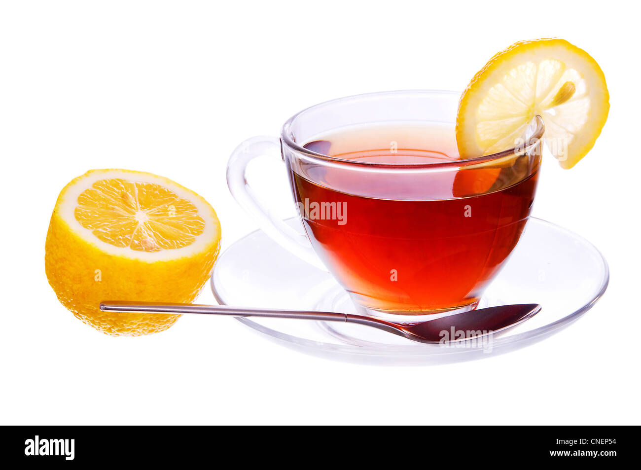 Transparent cup with black tea with a lemon and spoon isolated on white ...