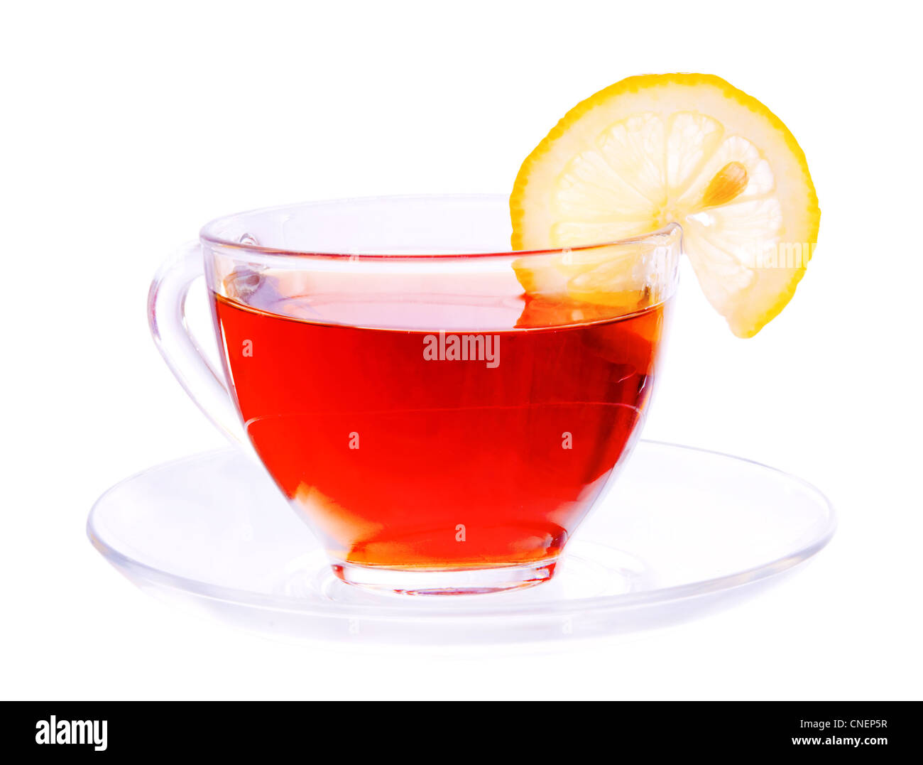 Transparent cup with black tea and segment of lemon isolated on white ...