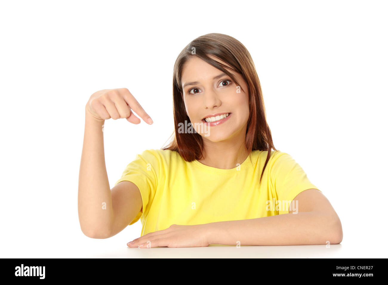 Happy woman pointing something, isolated on white background Stock ...