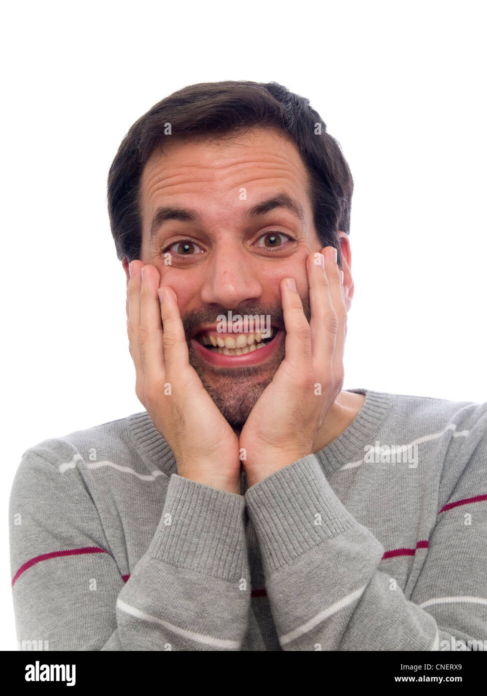 Portrait of an elated young man with beard looking at camera Stock ...