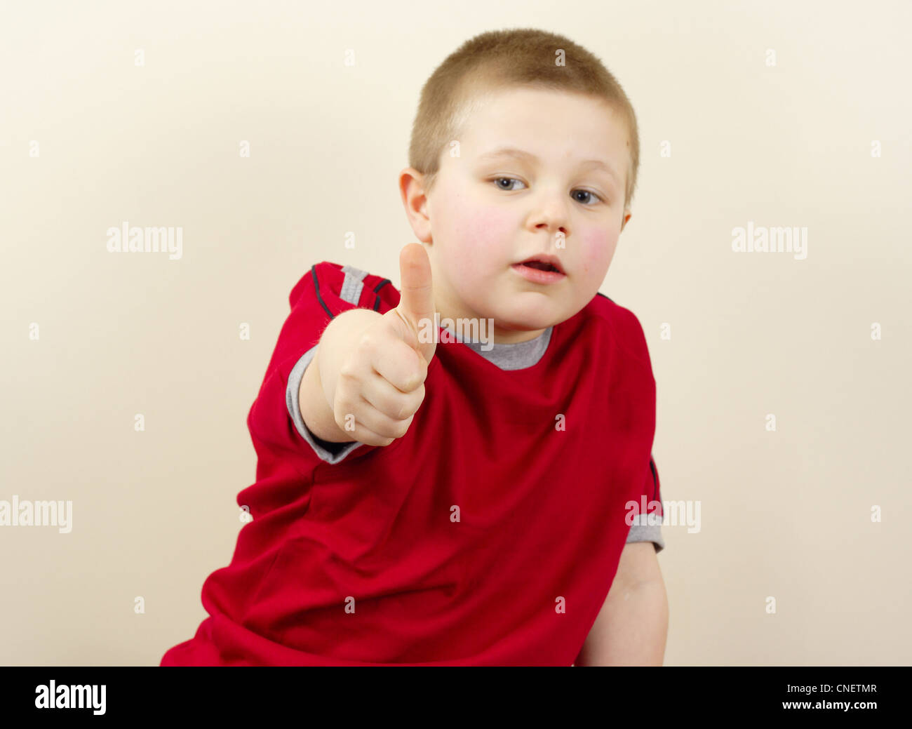 Small Boy with the extended hand gesture OK Stock Photo - Alamy
