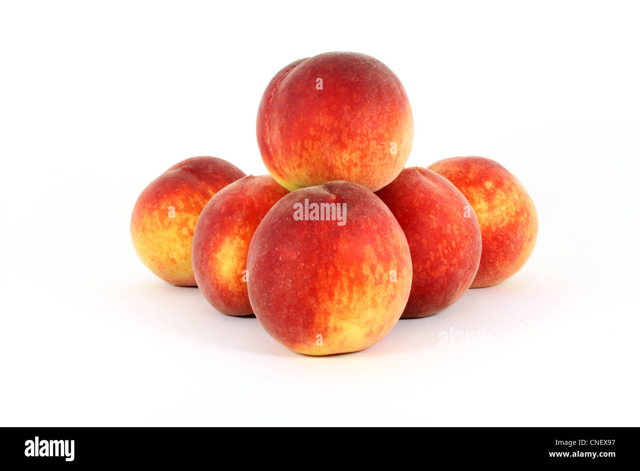 fresh colorful ripe peaches isolated on white Stock Photo - Alamy