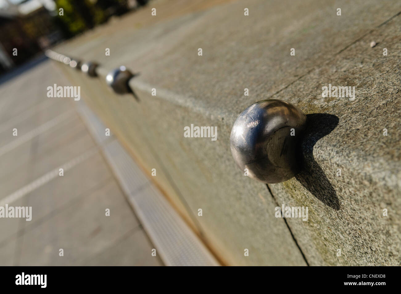 Anti-skateboarding devices installed on a low stone wall Stock Photo ...