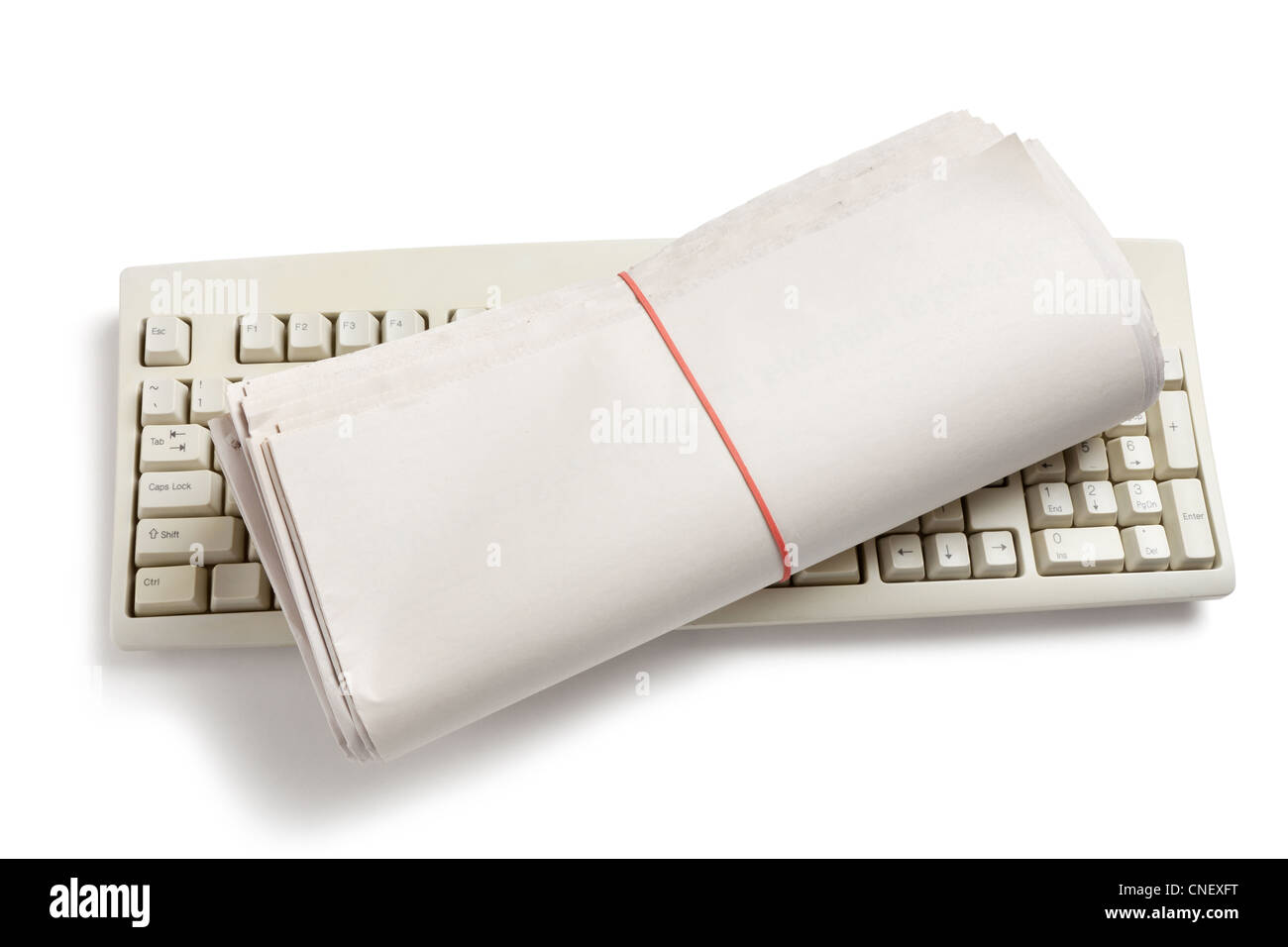 Computer Keyboard and Newspaper roll with white background Stock Photo ...