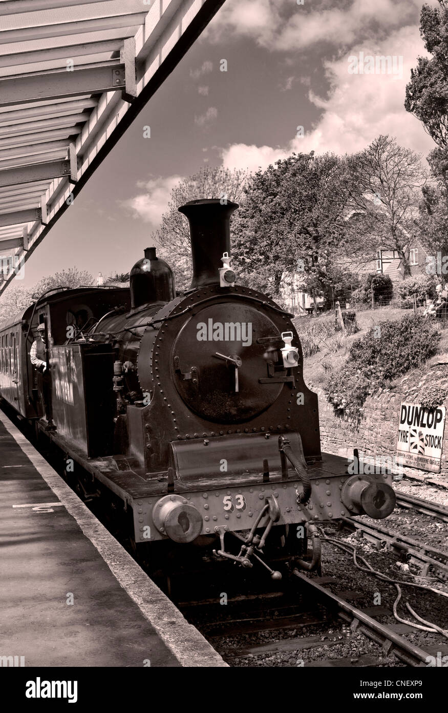 Steam Engine Locomotive and tourist carriages pulling into Swanage ...